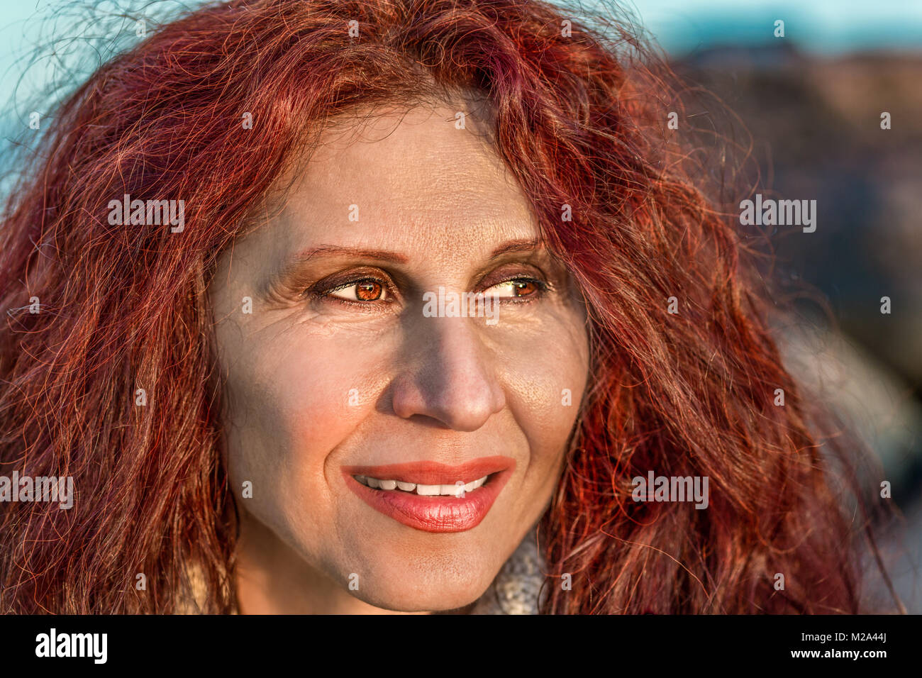 Portrait of woman face under intense sunlight Stock Photo - Alamy