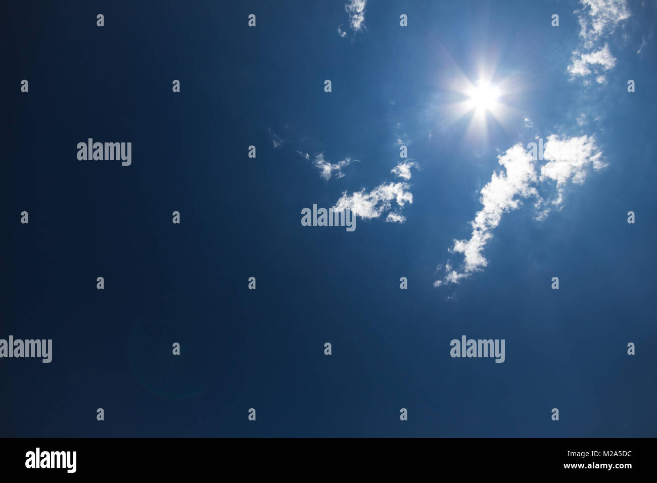 Blue sky sun hi-res stock photography and images - Alamy