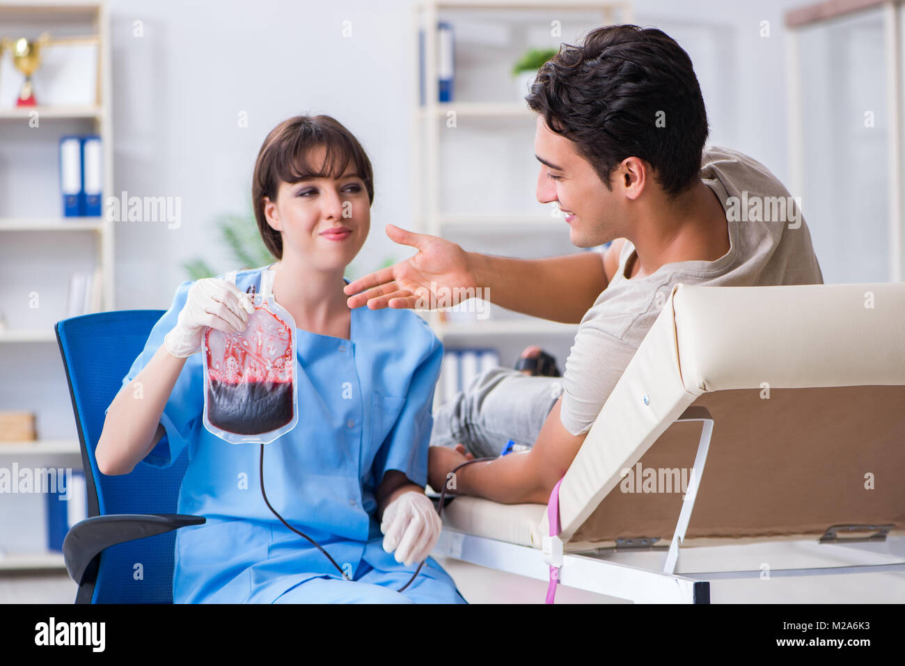 Patient getting blood transfusion in hospital clinic Stock Photo - Alamy