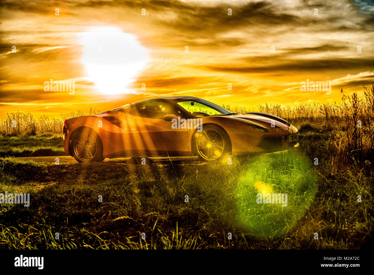 A Ferrari 488 GTB silhouetted against the sunset. 3.9 litre V8 0-62 mph ...