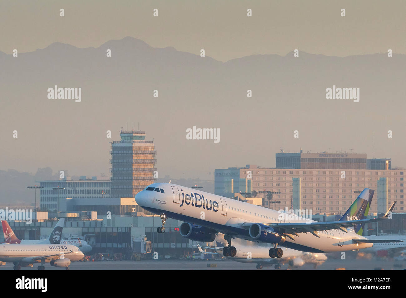 jetBlue Airways Airbus A321 Jet Airliner Taking Off From Runway 25 Left ...