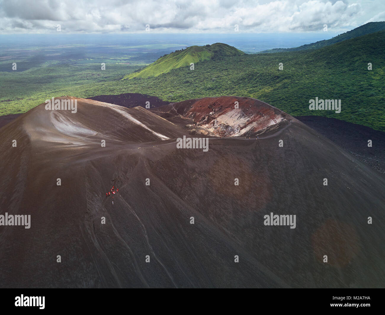 Volcano boarding theme. Above view on people doing extreme sport Stock ...