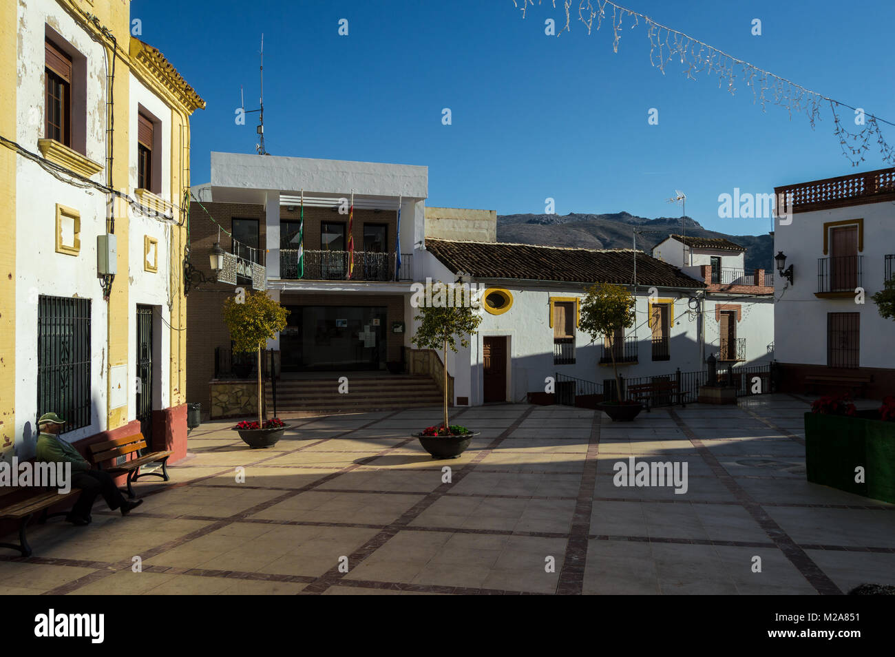 Views of the center of the white village of Benaojan with christmas ...