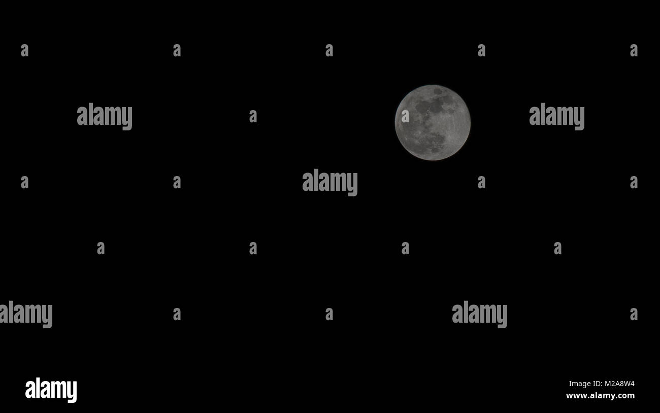 dark black night as background with full moon Stock Photo - Alamy