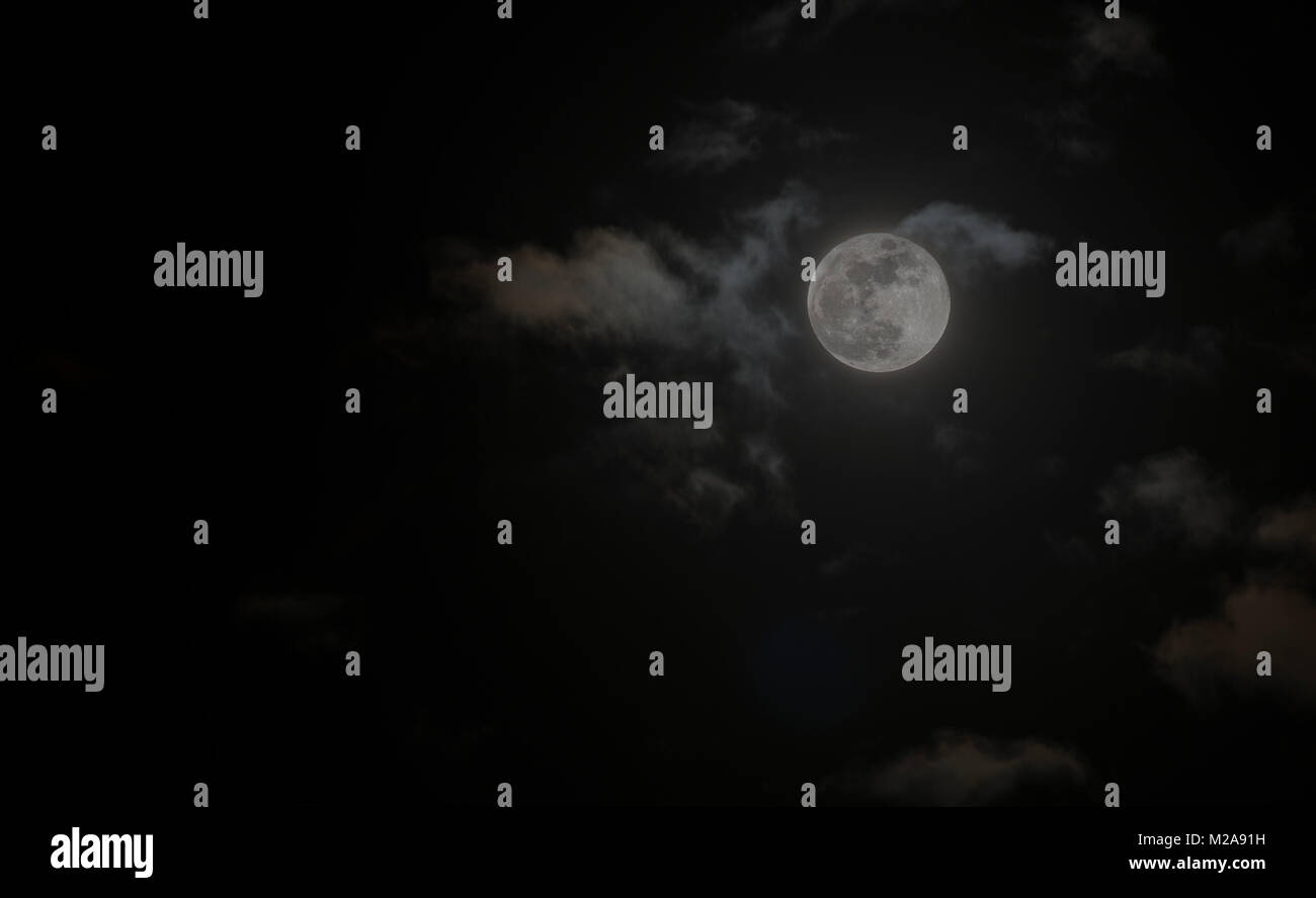 dark black night as background with full moon Stock Photo - Alamy