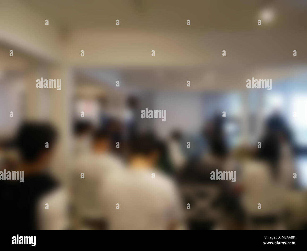 people listen to presentation in conference hall. audience in meeting ...