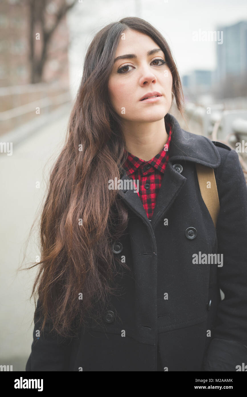 young beautiful woman posing outdoor looking camera smiling - carefree, freshness, thoughtless ...