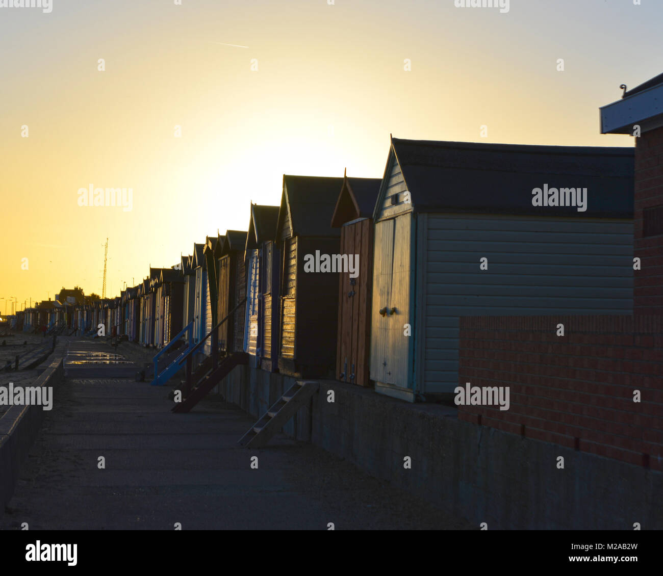 Beach huts, seting sun, Sunset, Walton on the Naze, Essex, England ...