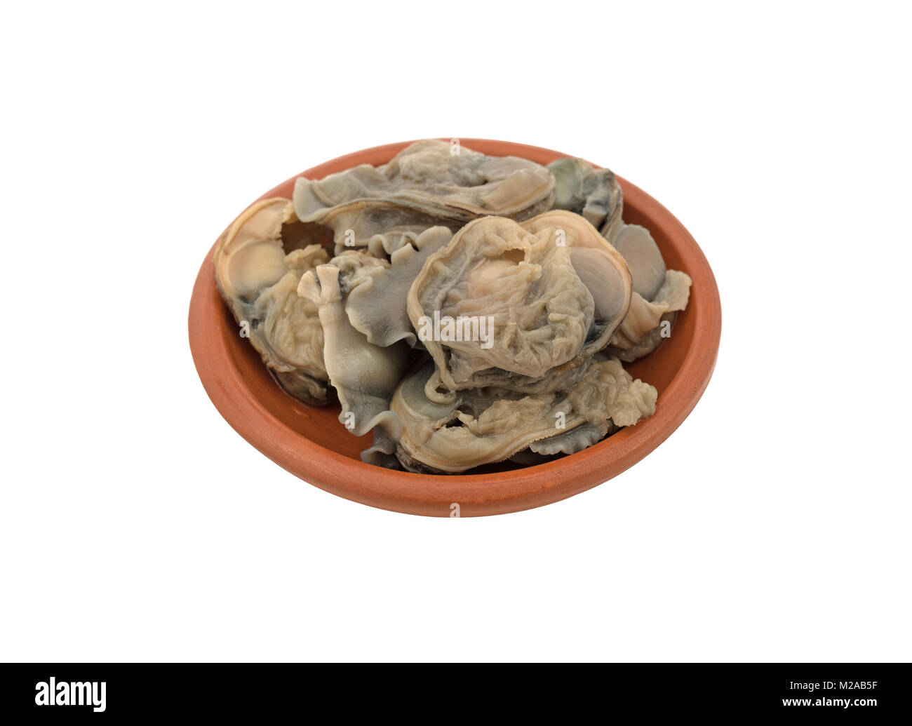 Side view of a small bowl filled with canned cherrystone clams isolated ...