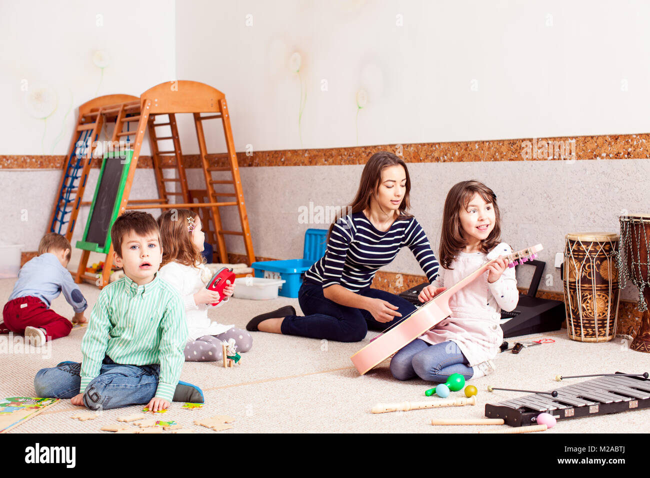 Music making lesson Stock Photo - Alamy