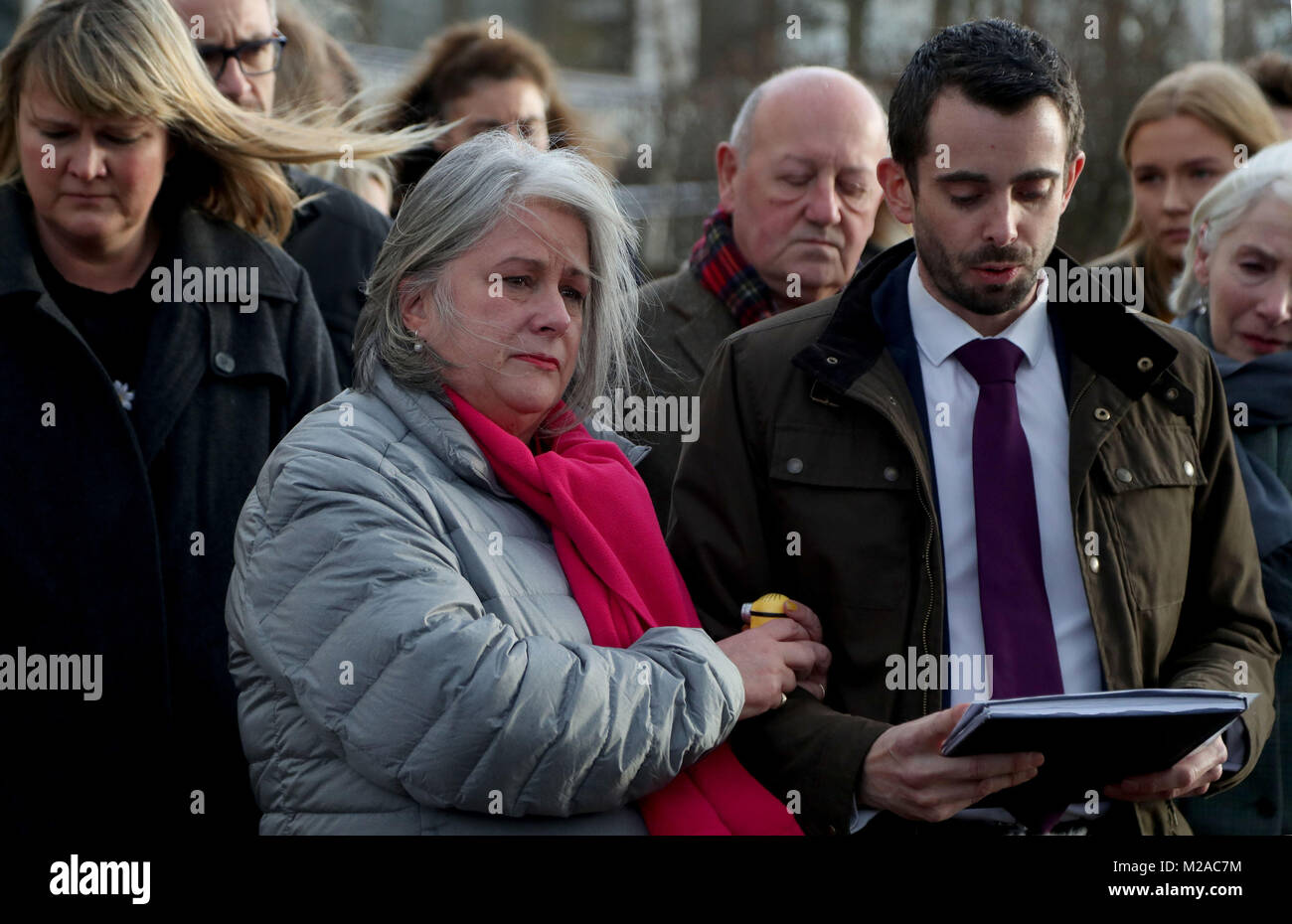 Joanne McLaren, mother of Molly McLaren, listens to a statement read ...
