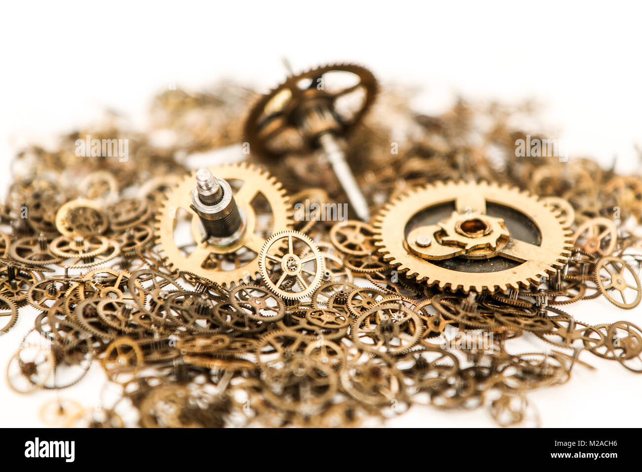 A picture of a small batch of cogwheels on a white background Stock ...