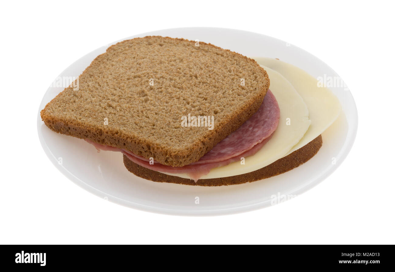 A genoa salami and provolone cheese on stone ground wheat bread ...