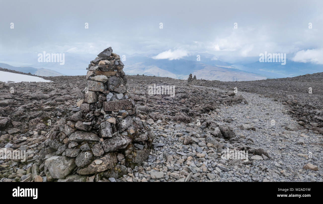 Ben Nevis mountain footpath, cairns and peak with snow. Scotland. UK ...
