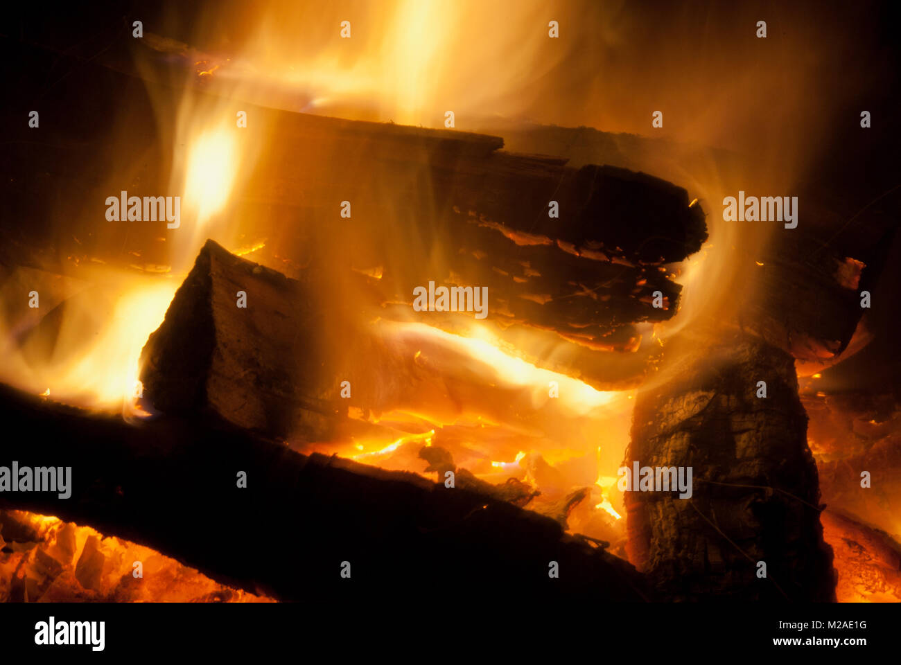 Closeup long exposure of logs burning in a fire Stock Photo - Alamy