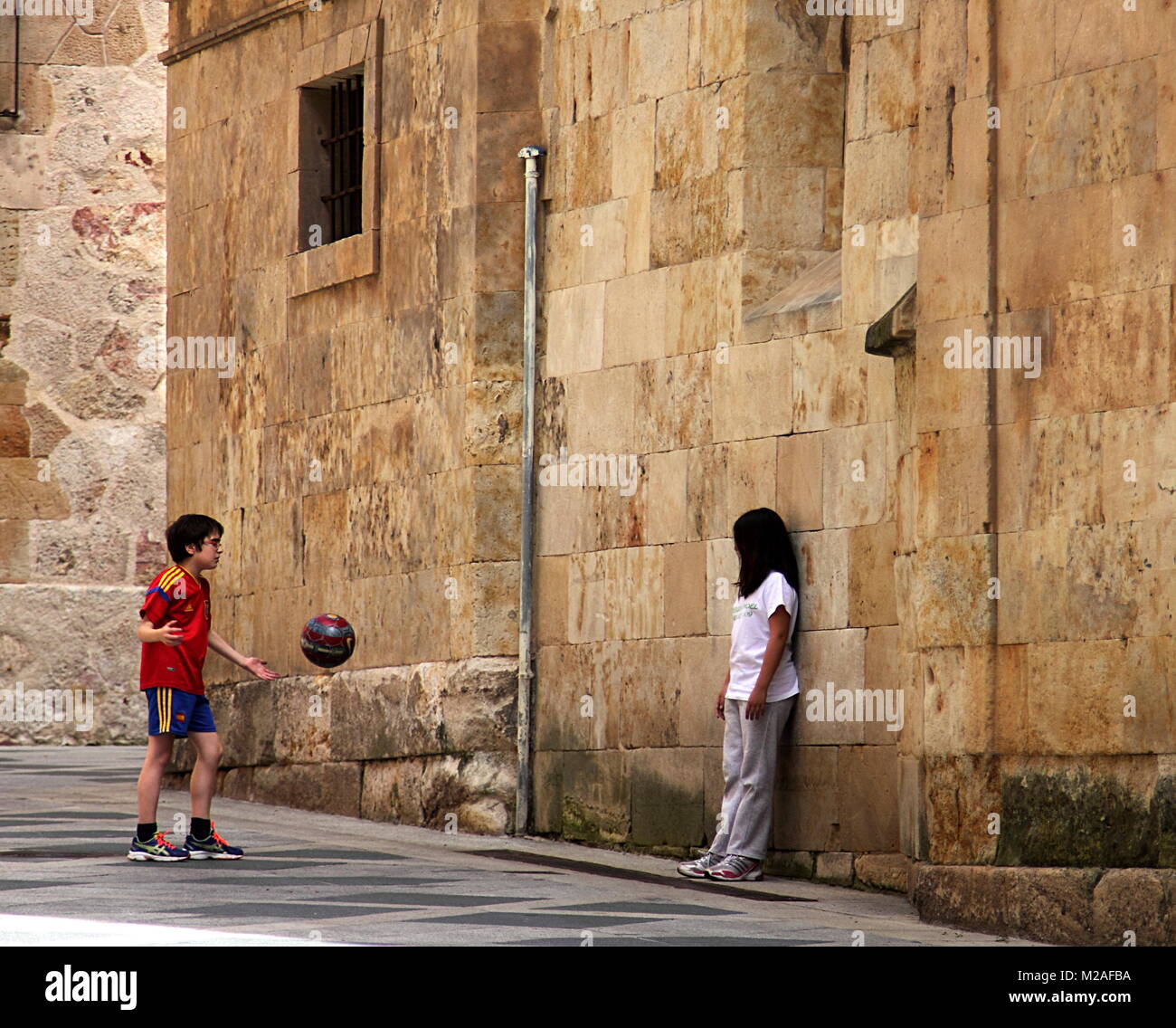 Salamanca, Spain - May 7, 2014: Kids playing in downtown of Salamanca ...