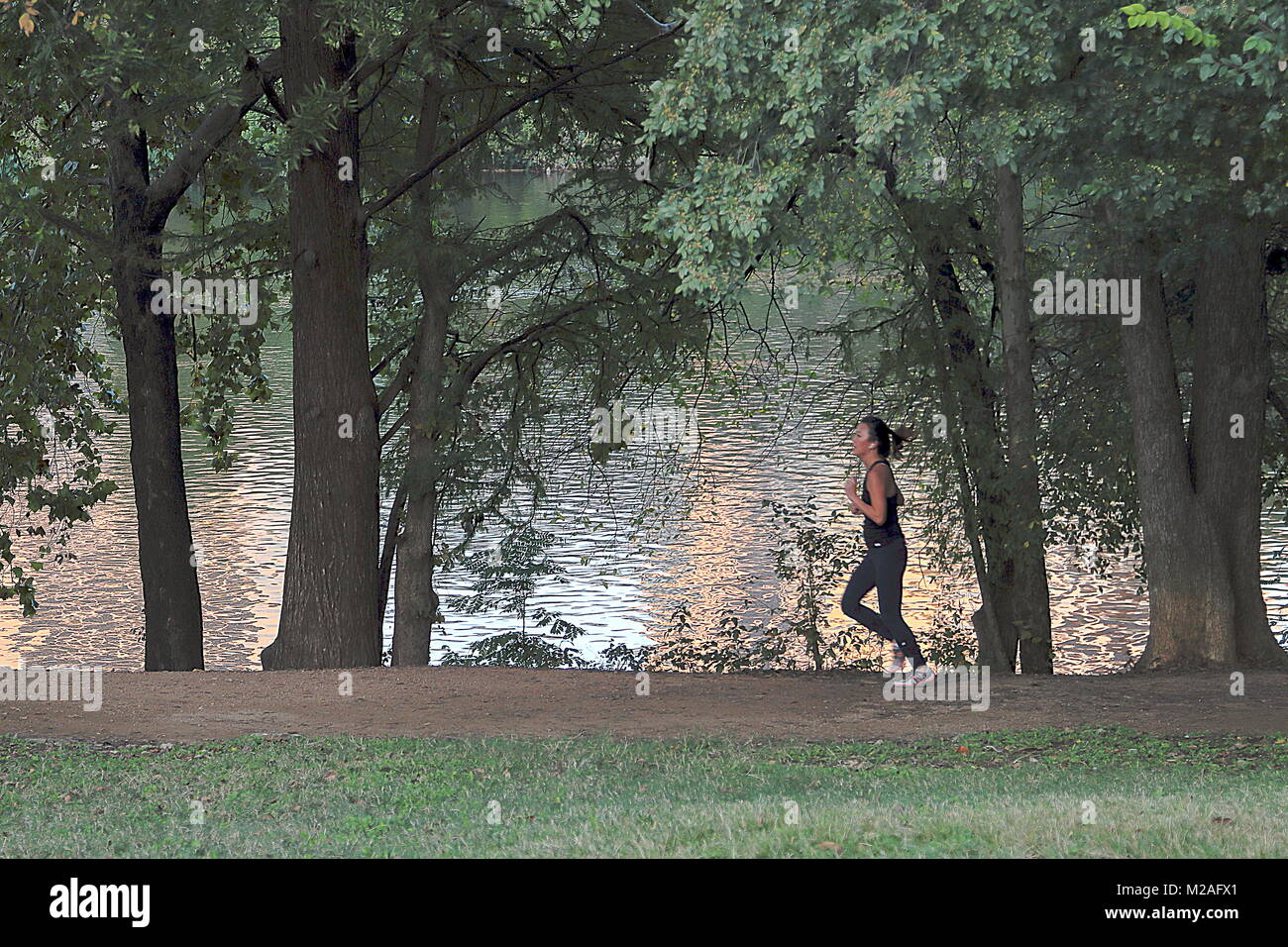 Jogging on canal path hi-res stock photography and images - Alamy