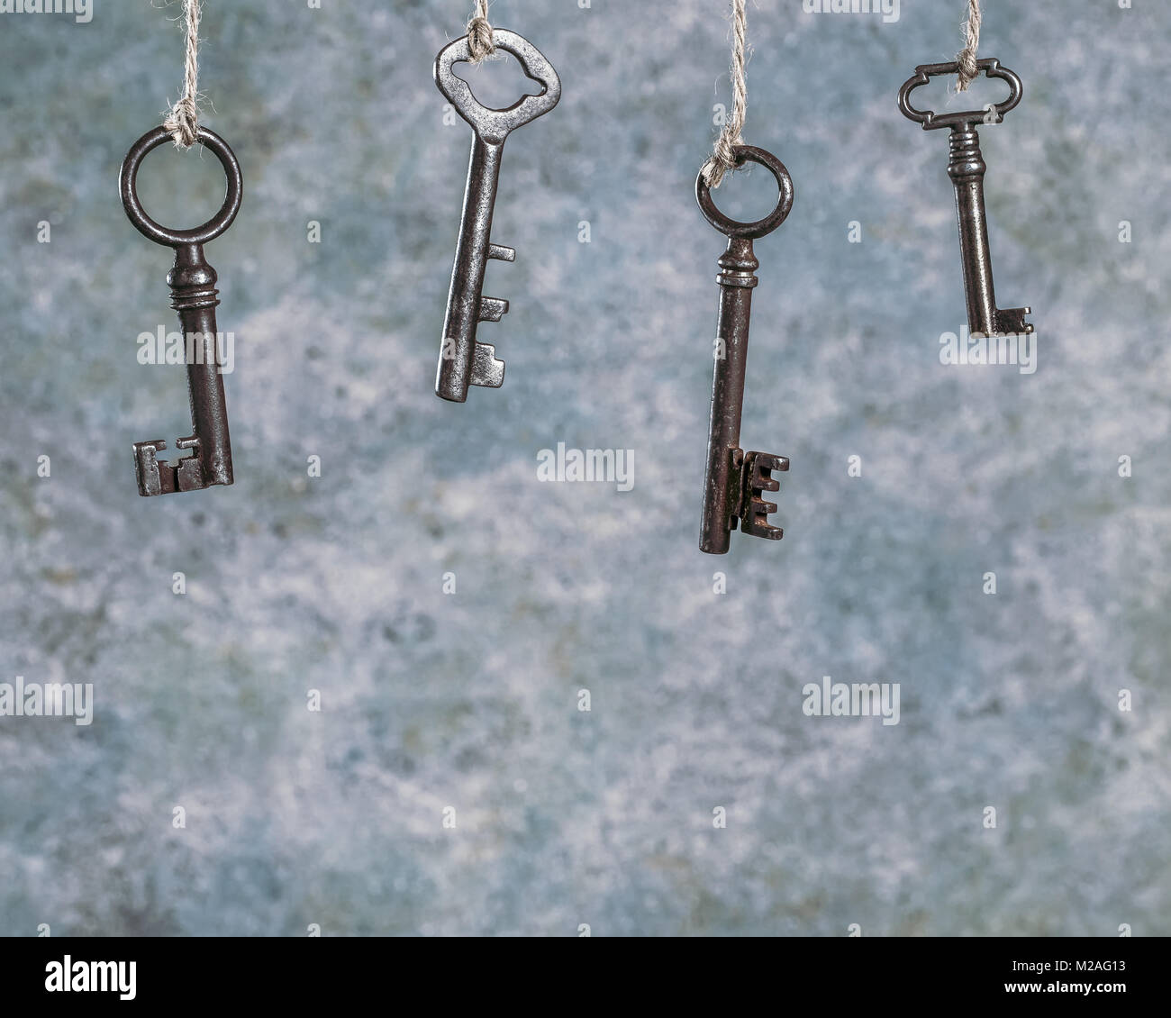 Few old keys hanging Stock Photo - Alamy