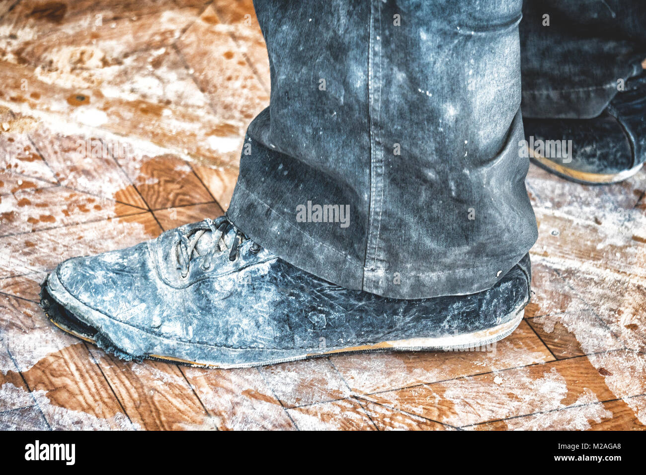 Old dirty ripped shoes Stock Photo - Alamy