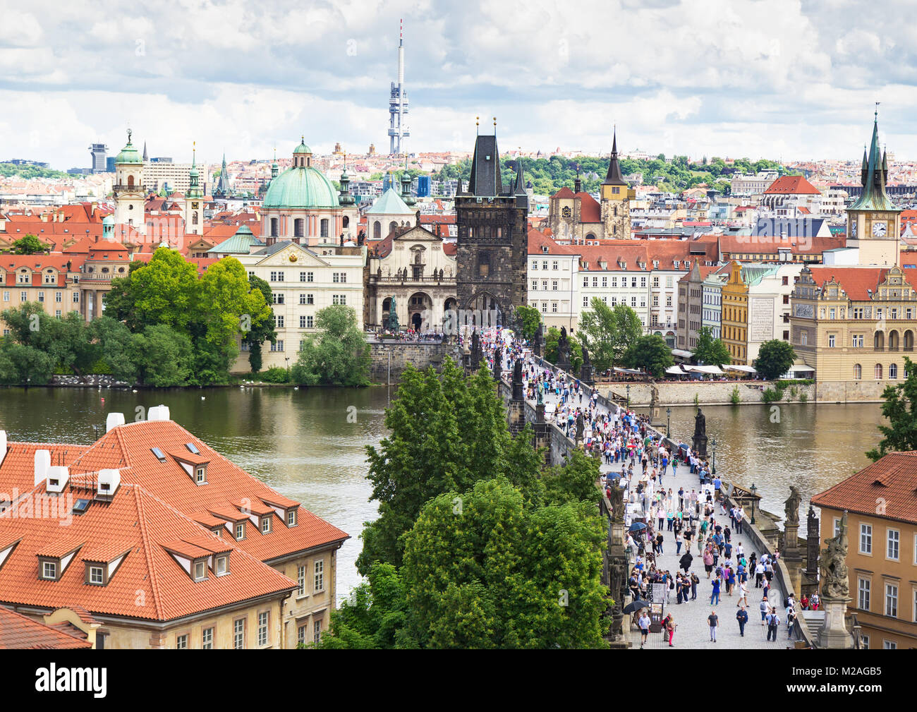 Tourists walking throught Charles Bridge Stock Photo - Alamy