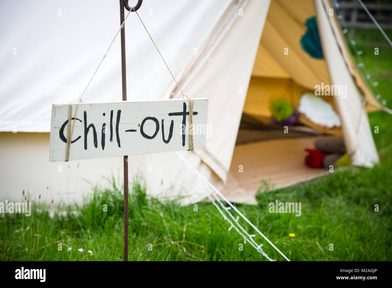 Tent with 'chill out' sign Stock Photo - Alamy