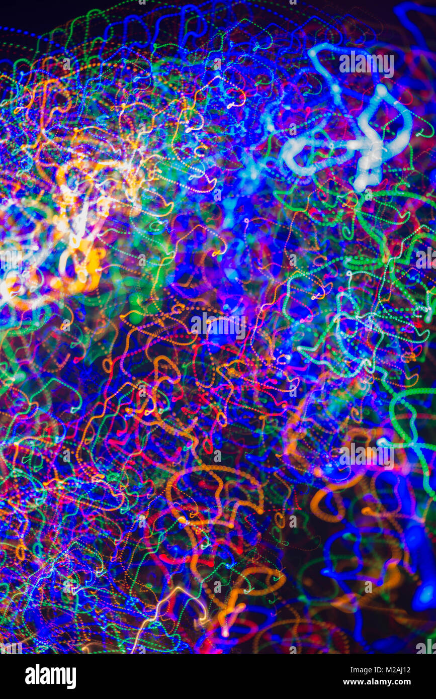 multicolored motion blurred lights in dark pattern Stock Photo - Alamy