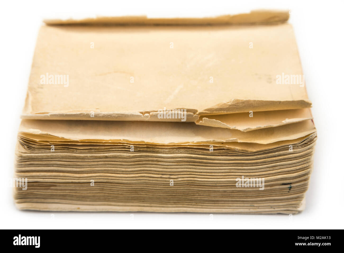 Old vintage book without cover on the white Stock Photo - Alamy