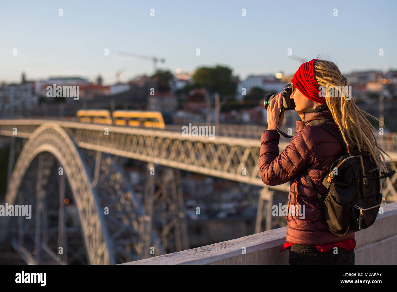 Young woman with dreadlocks on the viewing platform opposite the Dom ...