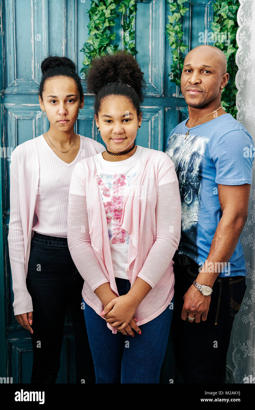 Father and two daughters Stock Photo - Alamy