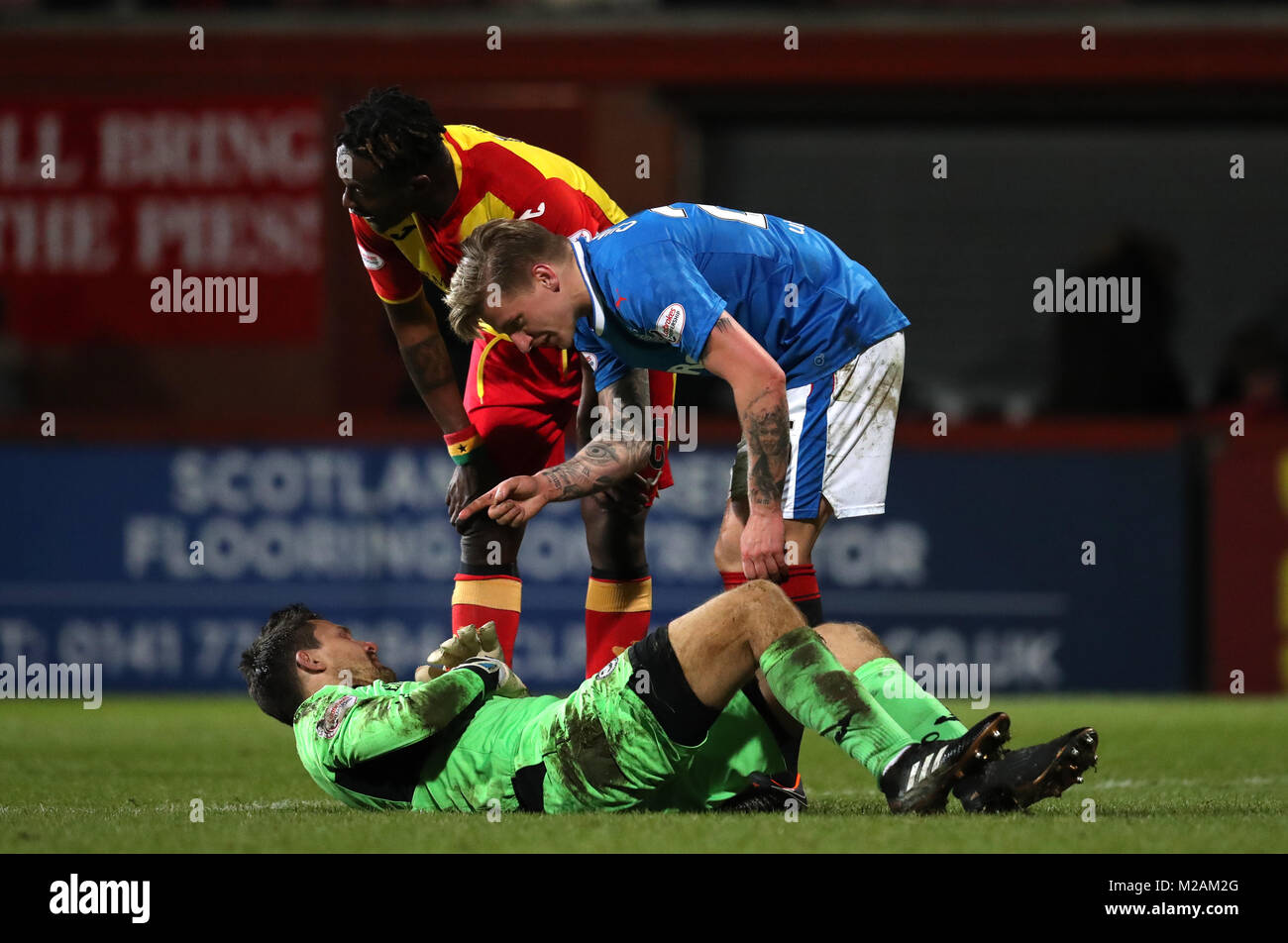 Partick Thistle's Tomas Cerny (floor) and Rangers' Jason Cummings ...