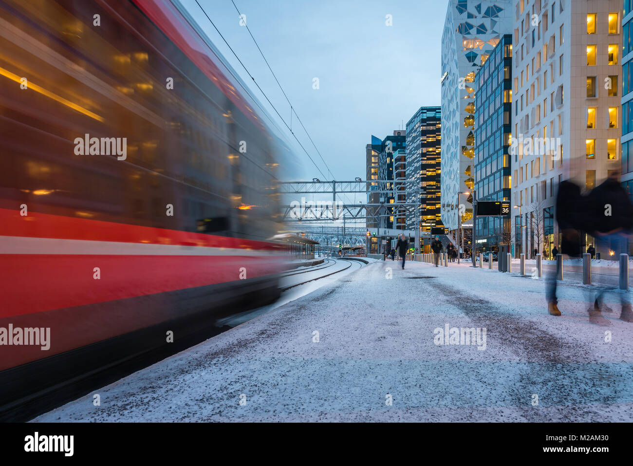 Train passing the Barcode district, a new business district in central ...