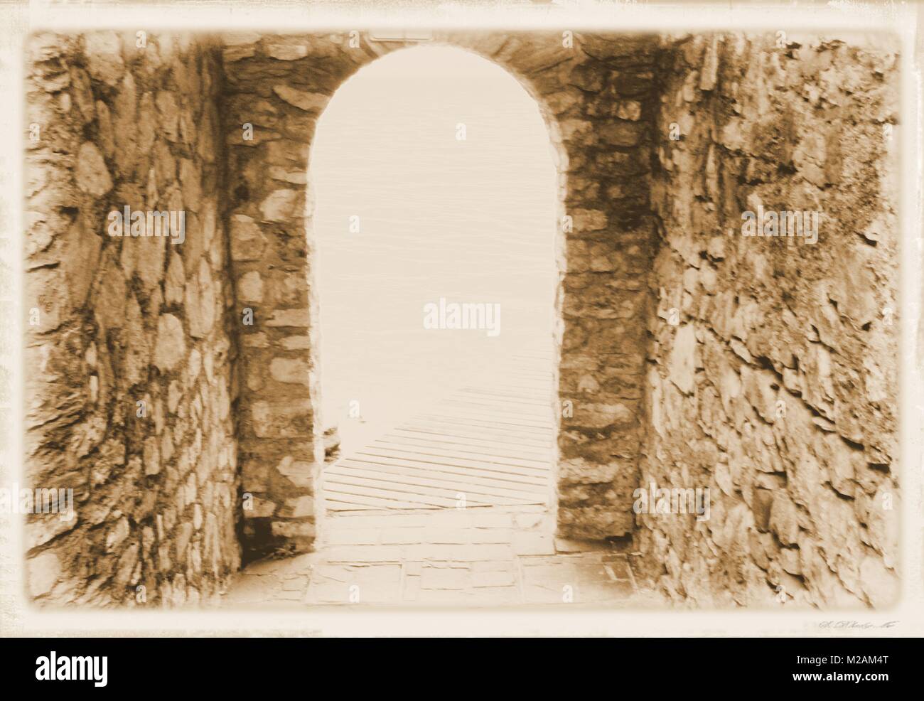ancient stone gate on the Garda lake in Italy Stock Photo - Alamy