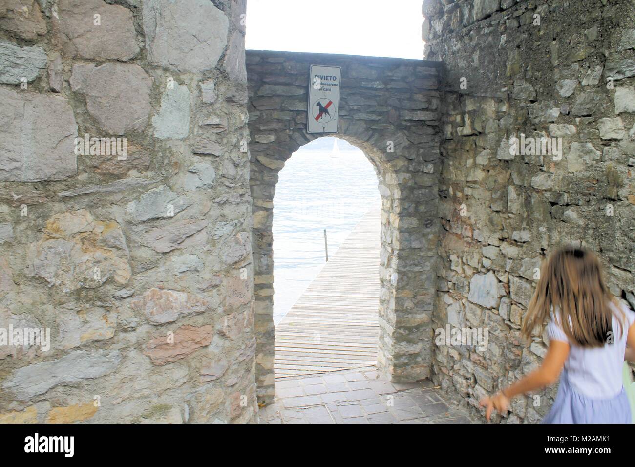 ancient stone gate on the Garda lake in Italy Stock Photo - Alamy