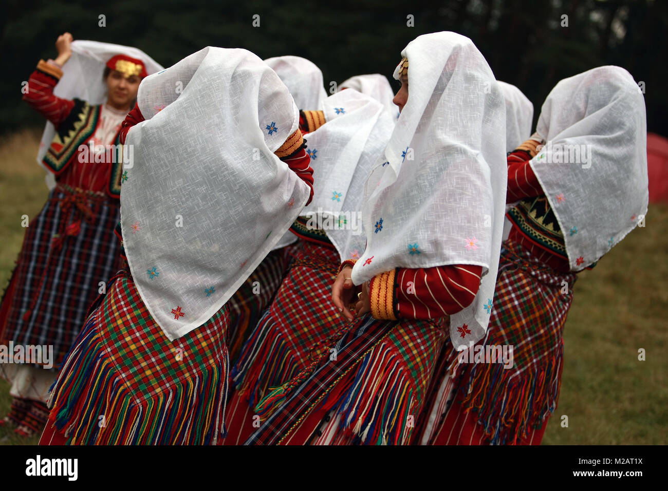People in traditional folk costume of The National Folklore Fair in ...
