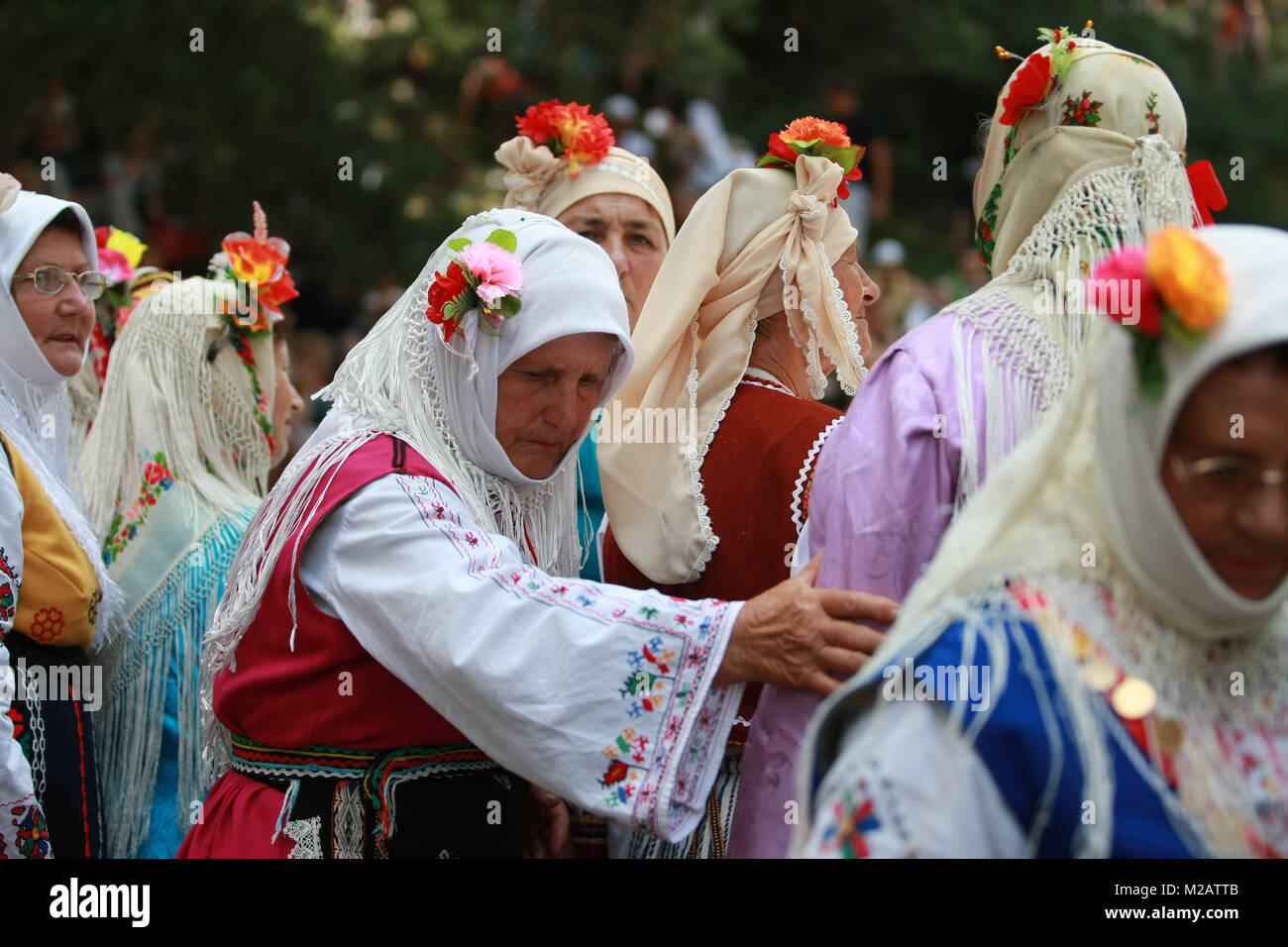 People in traditional folk costume of The National Folklore Fair in ...