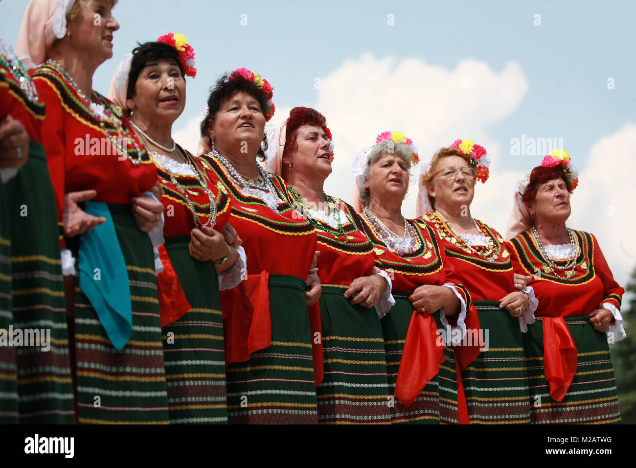 People in traditional folk costume of The National Folklore Fair in ...