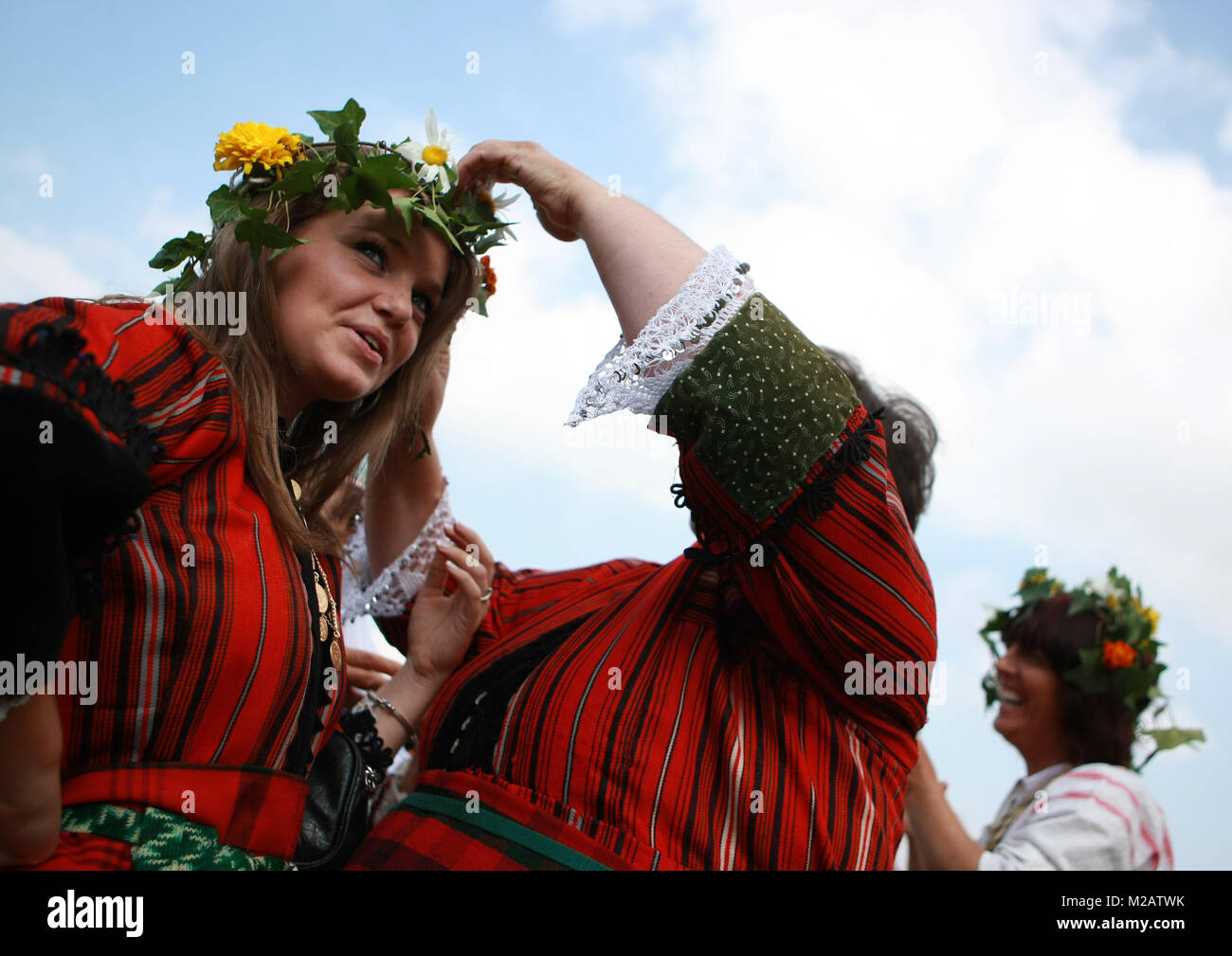 People in traditional folk costume of The National Folklore Fair in ...