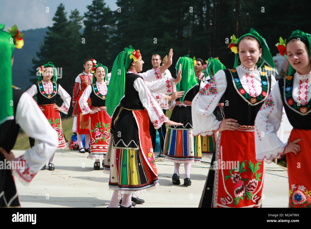 People in traditional folk costume of The National Folklore Fair in ...