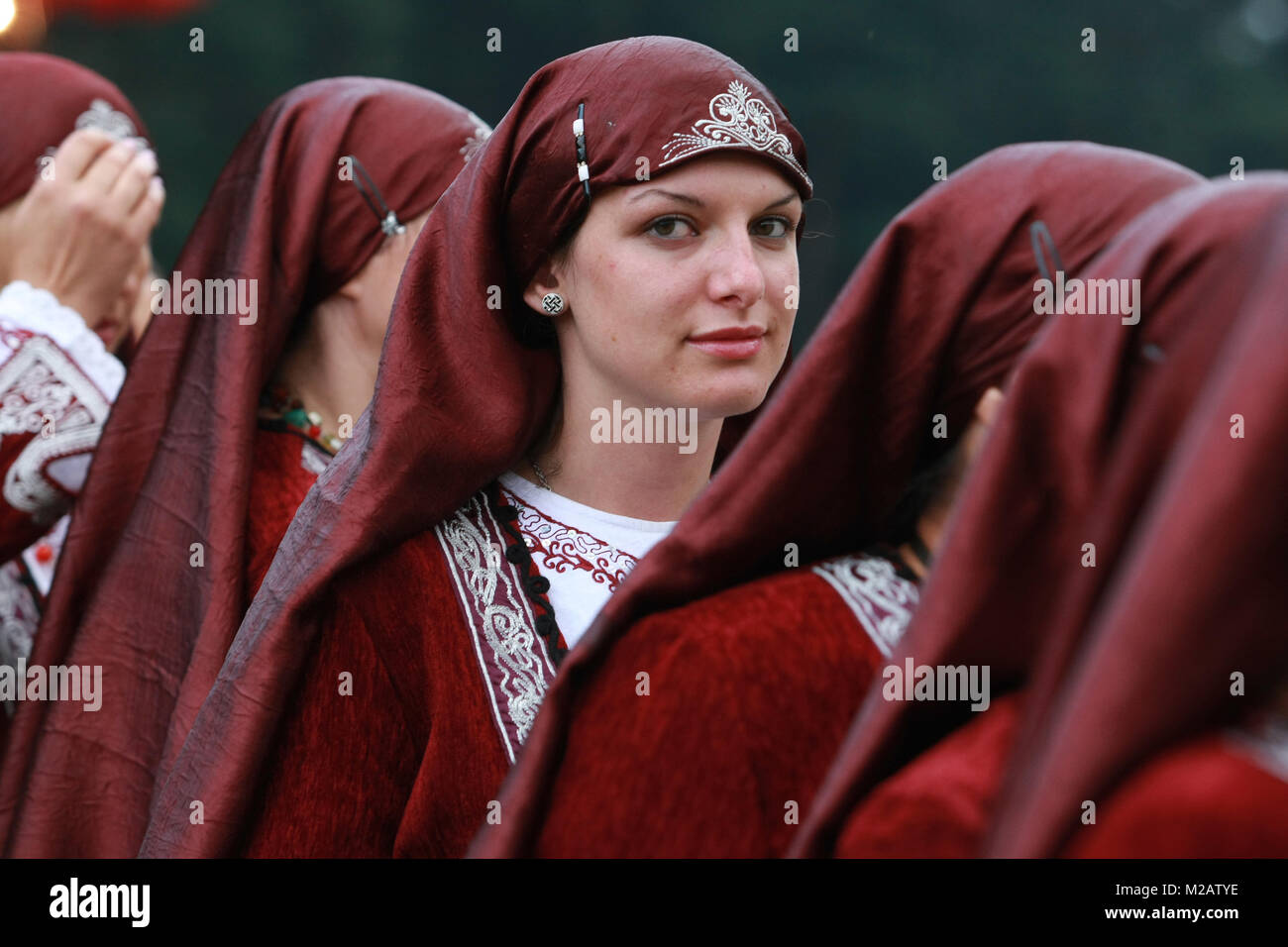 People in traditional folk costume of The National Folklore Fair in ...