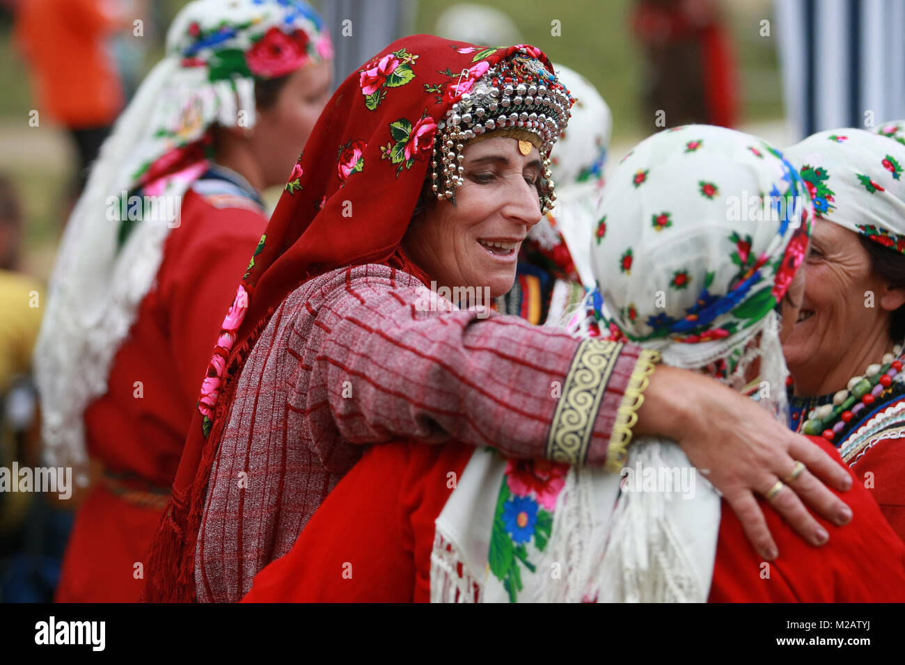 People in traditional folk costume of The National Folklore Fair in ...
