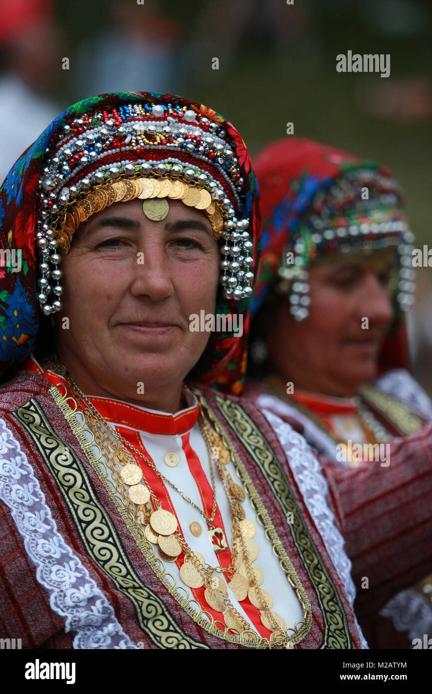 People in traditional folk costume of The National Folklore Fair in ...