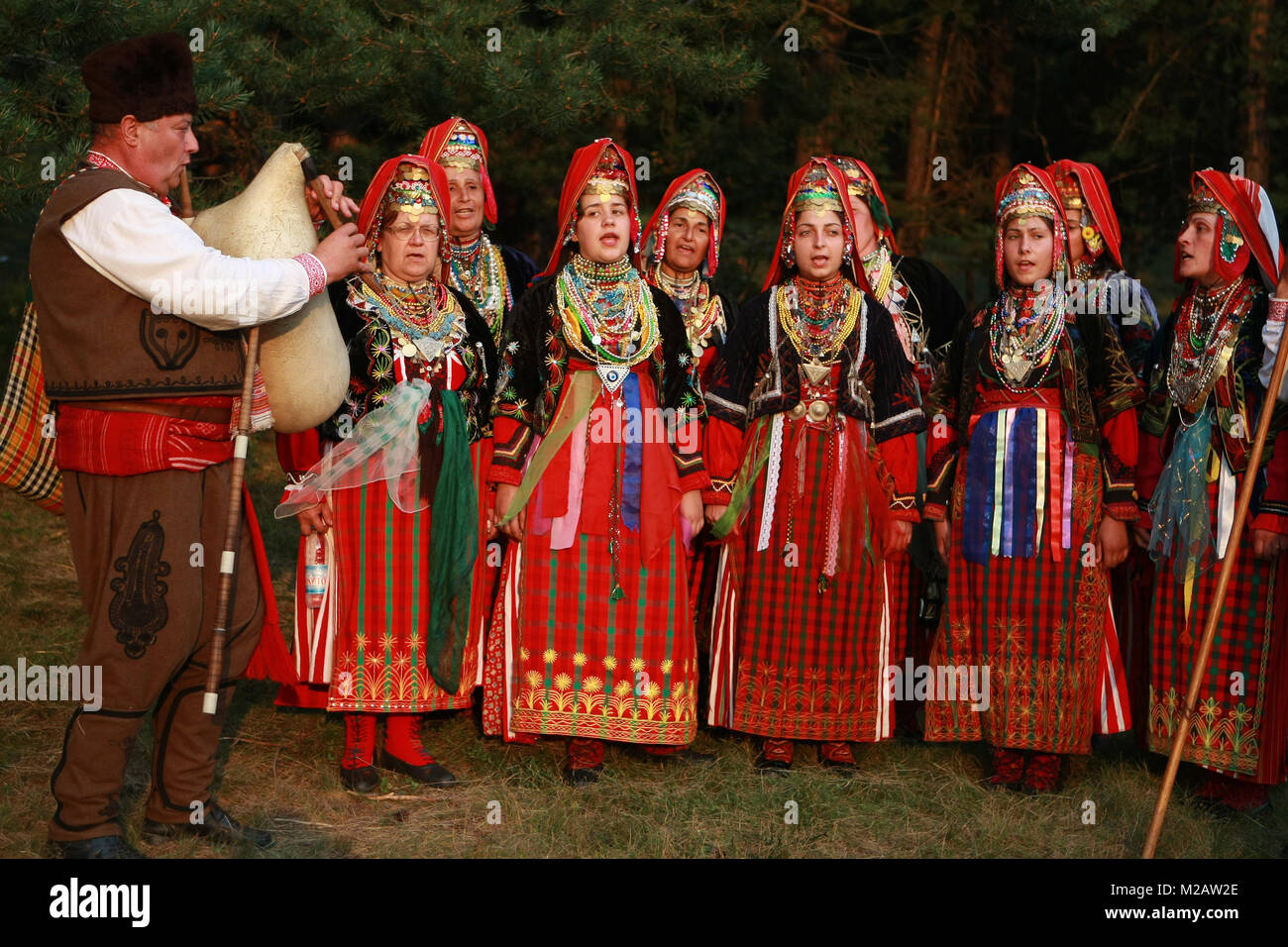 People in traditional folk costume of The National Folklore Fair in ...