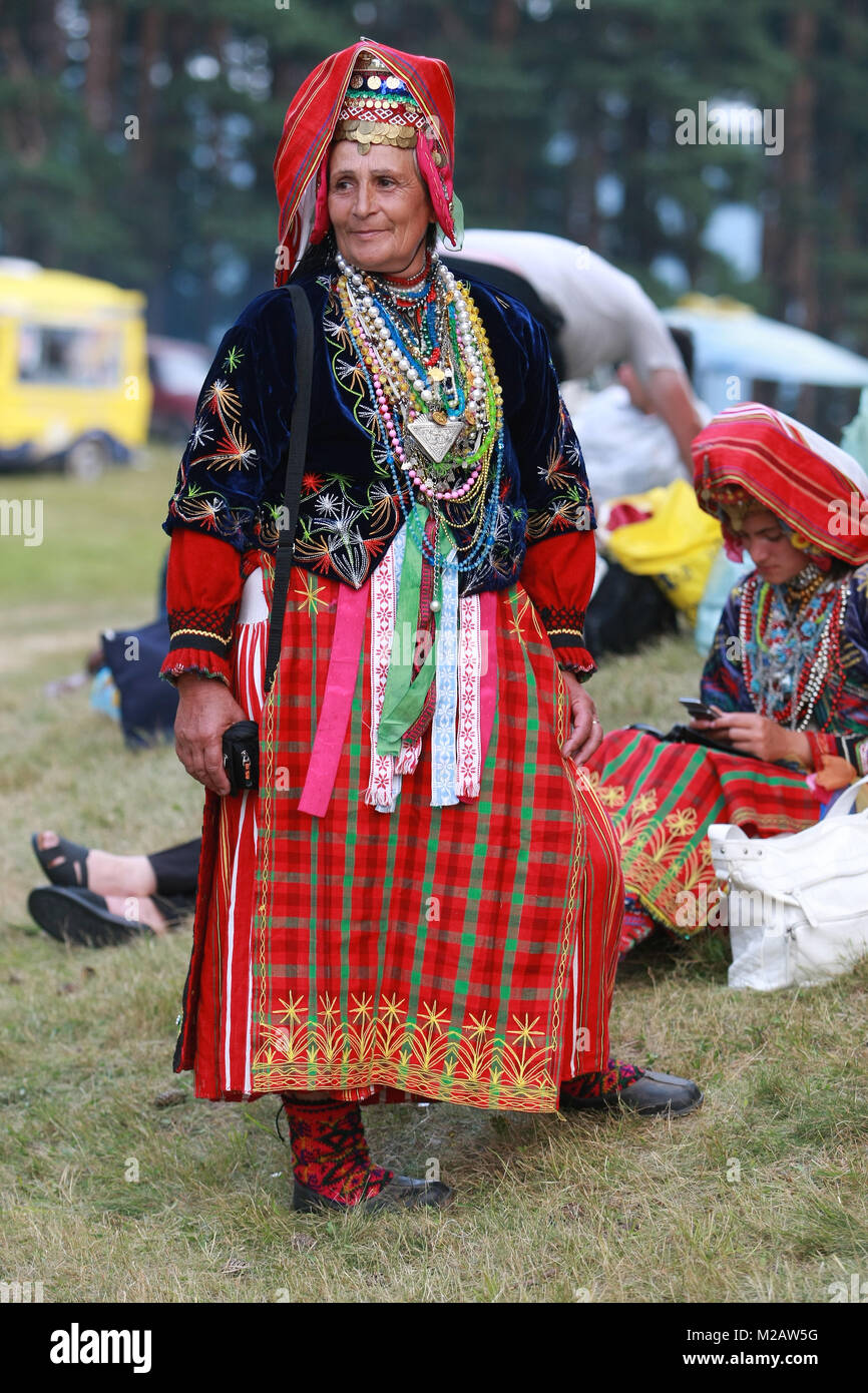 People in traditional folk costume of The National Folklore Fair in ...