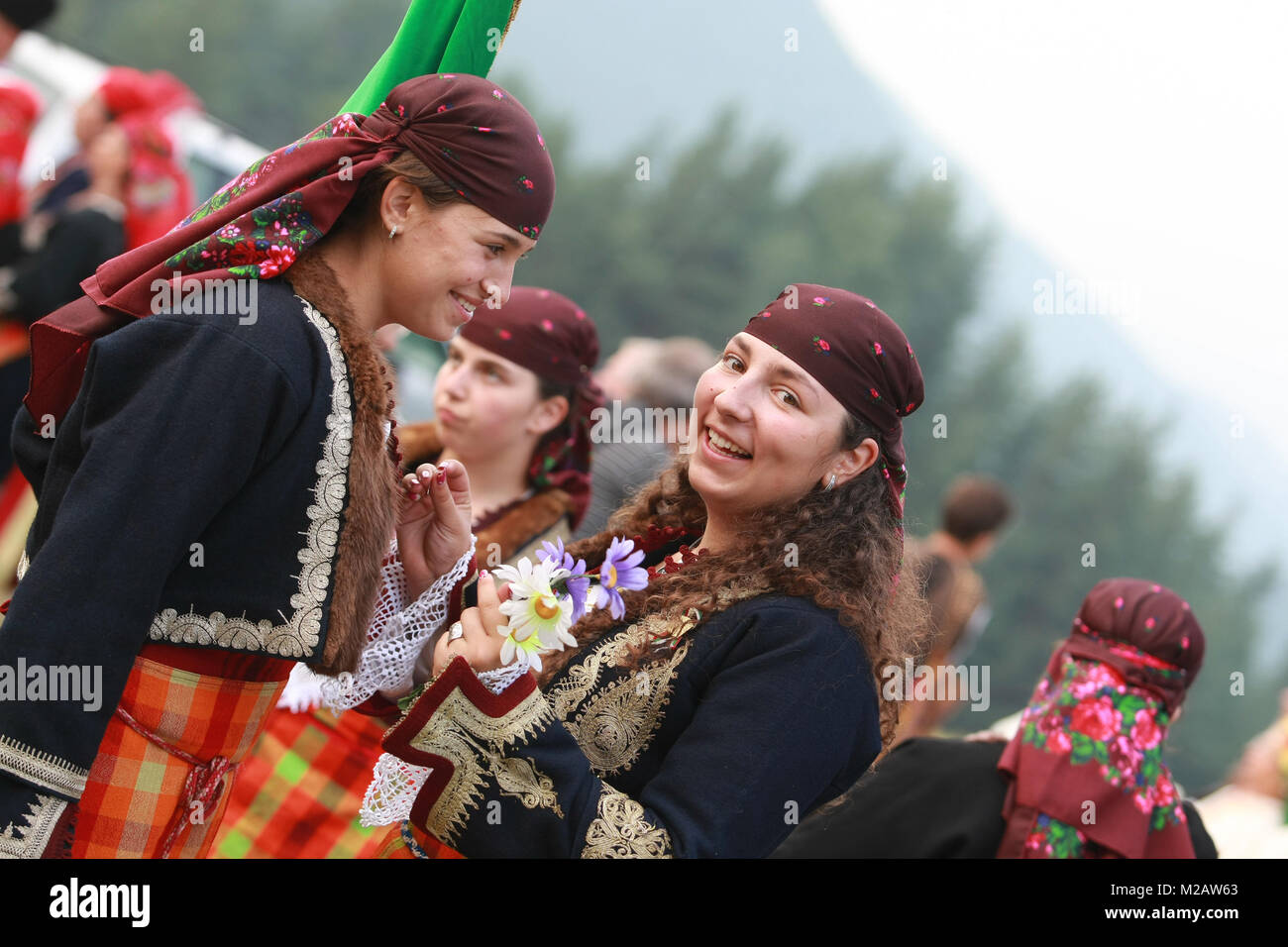 People in traditional folk costume of The National Folklore Fair in ...