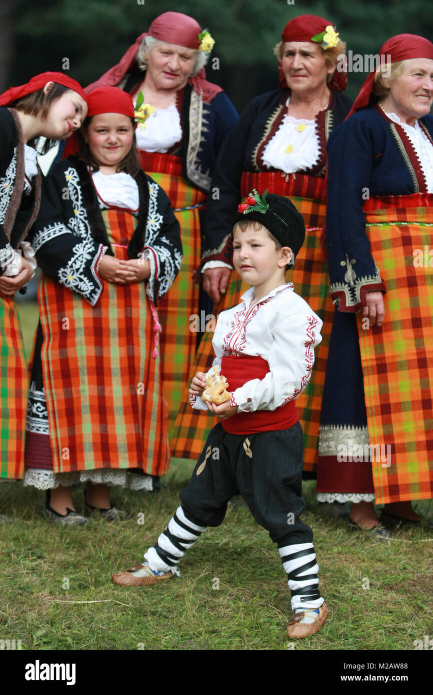 People in traditional folk costume of The National Folklore Fair in ...
