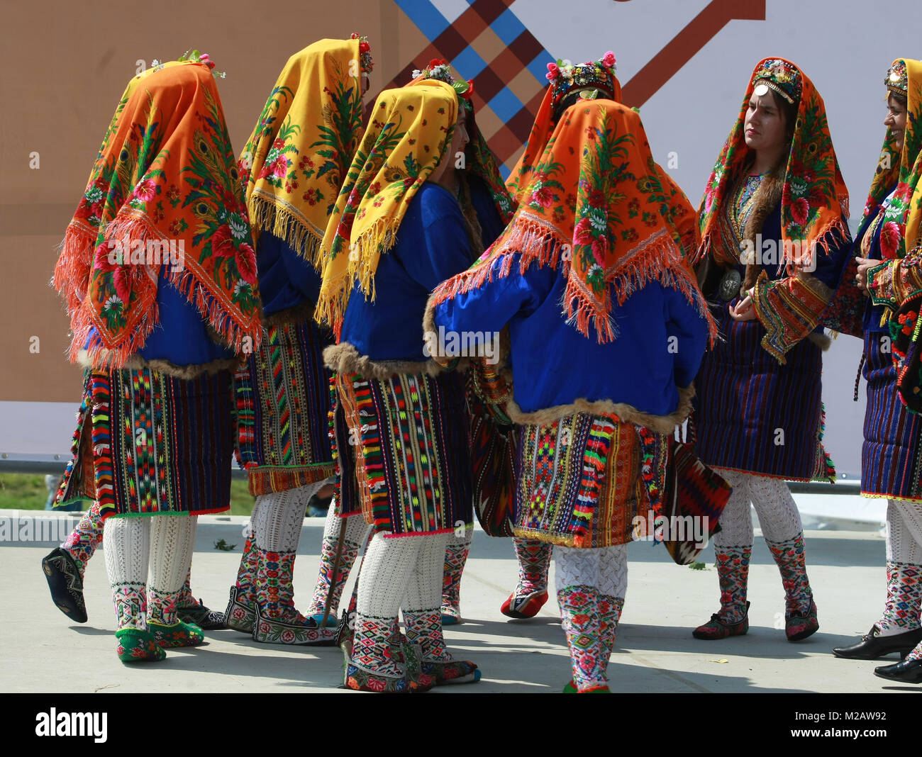 People in traditional folk costume of The National Folklore Fair in ...