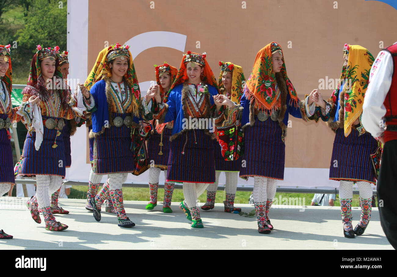 People in traditional folk costume of The National Folklore Fair in ...