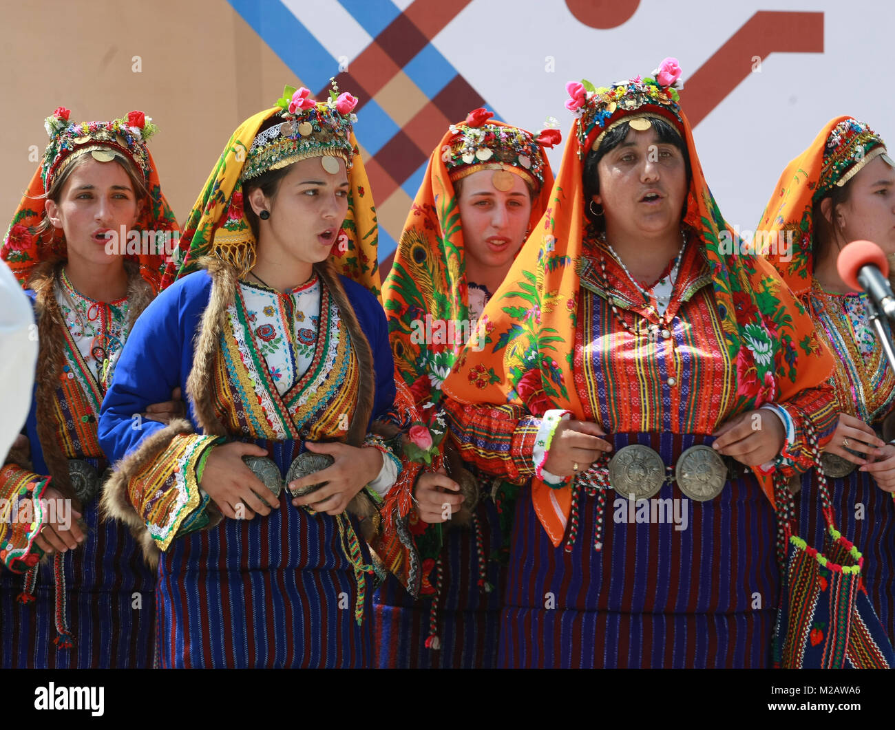 People in traditional folk costume of The National Folklore Fair in ...