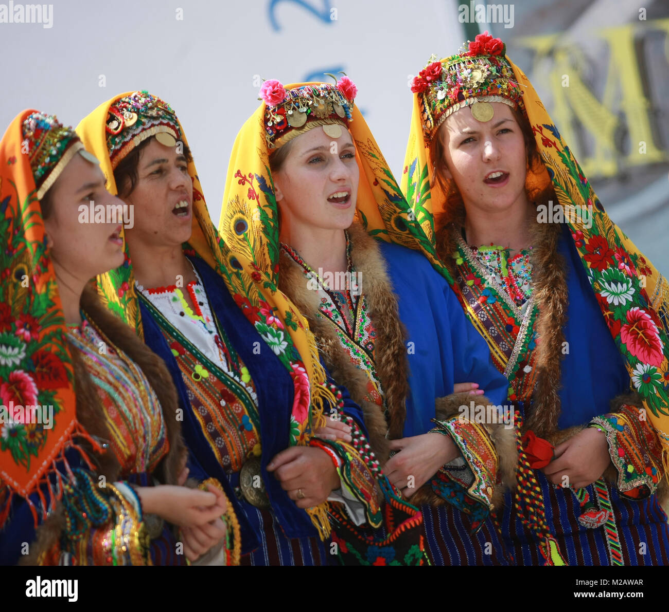 People in traditional folk costume of The National Folklore Fair in ...