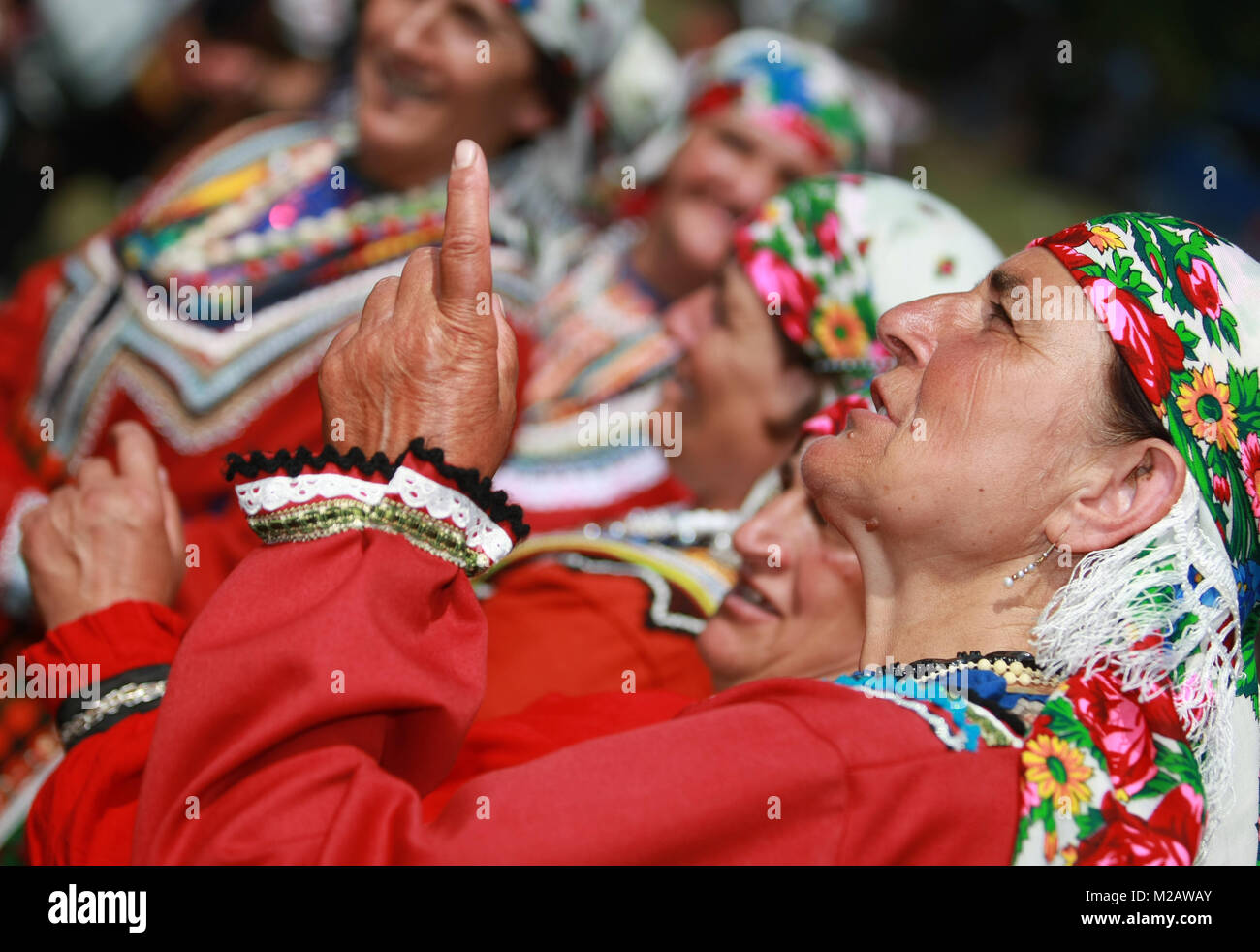 People in traditional folk costume of The National Folklore Fair in ...